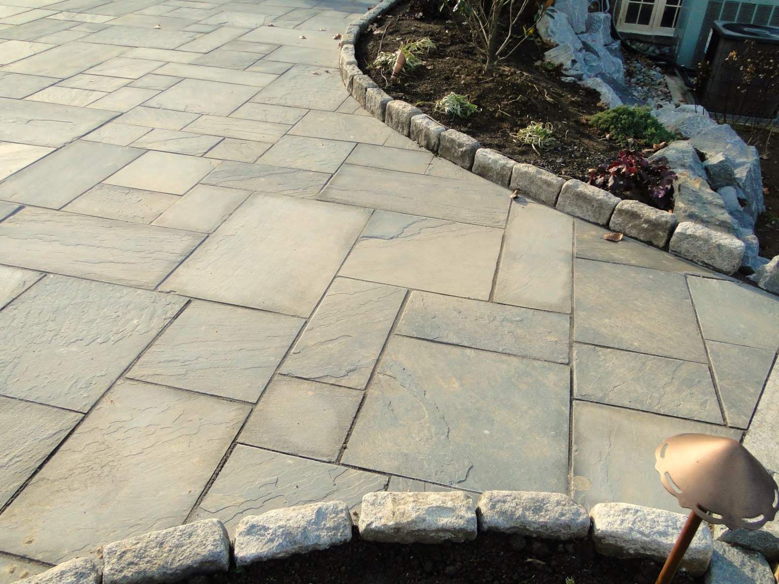 Natural Cleft vs. Thermal Bluestone - Robinson Flagstone